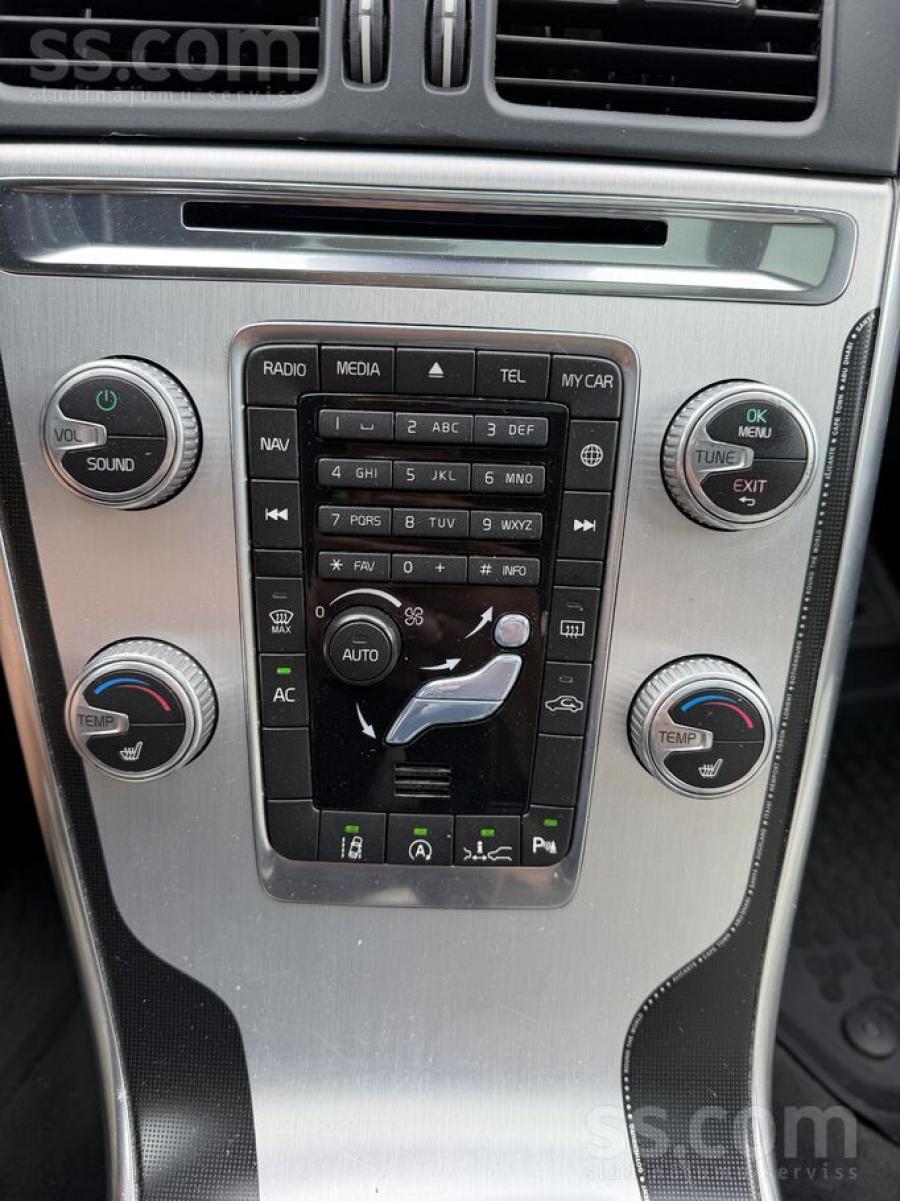 Black Volvo XC60 2016 in Riga, with an engine capacity of 2.00 L and mileage of 338 thousand km for 8200 €, photo 19 on AUTOMOTO.COM.LV