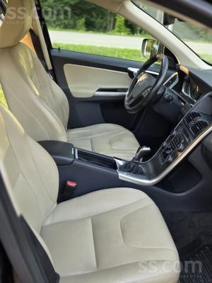 Black Volvo XC60 2016 in Ogre, with an engine capacity of 2.00 L and mileage of 217 thousand km for 11500 €, photo 15 on AUTOMOTO.COM.LV
