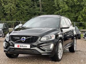 Black Volvo XC60 2016 in Utena, with an engine capacity of 2.40 L and mileage of 275 thousand km for 14450 €, photo 7 on AUTOMOTO.COM.LV