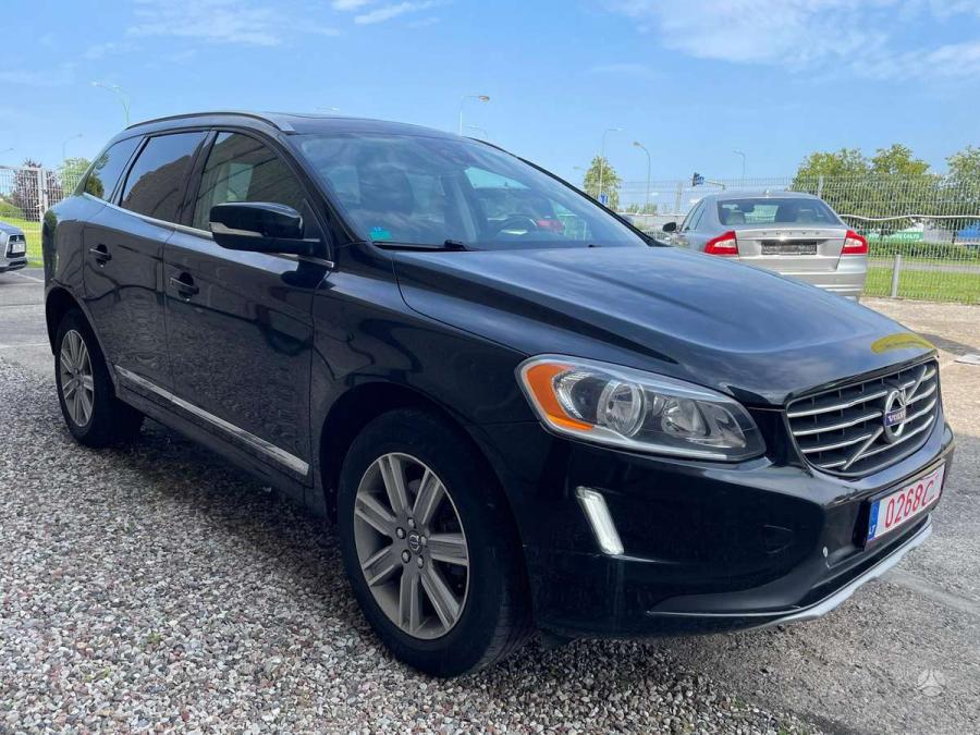 Black Volvo XC60 2016 in Klaipeda, with an engine capacity of 2.50 L and mileage of 240 thousand km for 12900 €, photo 4 on AUTOMOTO.COM.LV
