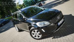 Black Volvo XC60 2016 in Riga, with an engine capacity of 2.00 L and mileage of 238 thousand km for 11450 €, photo 5 on AUTOMOTO.COM.LV