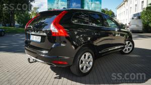 Black Volvo XC60 2016 in Riga, with an engine capacity of 2.00 L and mileage of 238 thousand km for 11450 €, photo 7 on AUTOMOTO.COM.LV