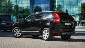 Black Volvo XC60 2016 in Riga, with an engine capacity of 2.00 L and mileage of 238 thousand km for 11450 €, photo 8 on AUTOMOTO.COM.LV