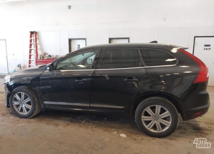 Black Volvo XC60 2016 in Alytus, with an engine capacity of 2.00 L and mileage of 219 thousand km for 8350 €, photo 3 on AUTOMOTO.COM.LV
