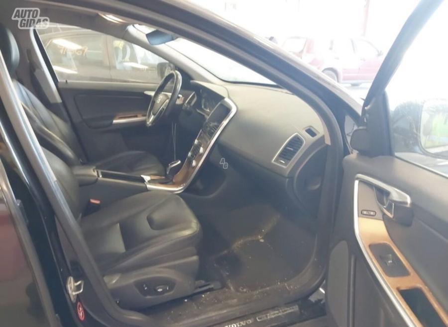Black Volvo XC60 2016 in Alytus, with an engine capacity of 2.00 L and mileage of 219 thousand km for 8350 €, photo 9 on AUTOMOTO.COM.LV