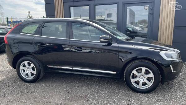Black Volvo XC60 2017 in Marijampole, with an engine capacity of 2.40 L and mileage of 280 thousand km for 15350 €, photo 5 on AUTOMOTO.COM.LV