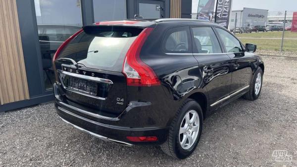 Black Volvo XC60 2017 in Marijampole, with an engine capacity of 2.40 L and mileage of 280 thousand km for 15350 €, photo 6 on AUTOMOTO.COM.LV