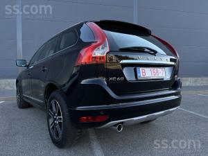 Black Volvo XC60 2017 in Riga, with an engine capacity of 2.00 L and mileage of 247 thousand km for 13900 €, photo 4 on AUTOMOTO.COM.LV