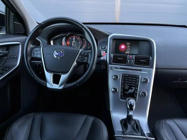 Black Volvo XC60 2017 in Riga, with an engine capacity of 2.00 L and mileage of 247 thousand km for 13900 €, photo 5 on AUTOMOTO.COM.LV