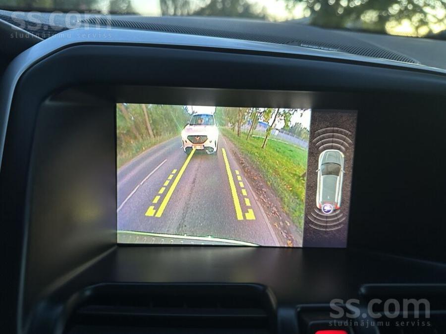 Black Volvo XC60 2017 in Riga, with an engine capacity of 2.40 L and mileage of 234 thousand km for 17200 €, photo 21 on AUTOMOTO.COM.LV