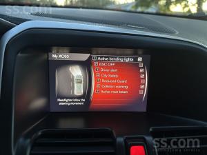 Black Volvo XC60 2017 in Riga, with an engine capacity of 2.40 L and mileage of 234 thousand km for 17200 €, photo 22 on AUTOMOTO.COM.LV