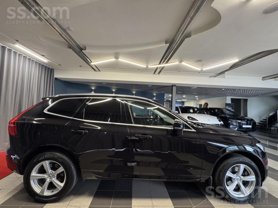 Black Volvo XC60 2020 in Riga, with an engine capacity of 2.00 L and mileage of 205 thousand km for 23990 €, photo 6 on AUTOMOTO.COM.LV