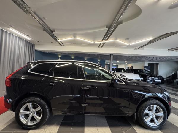 Black Volvo XC60 2020 in Riga, with an engine capacity of 2.00 L and mileage of 205 thousand km for 23990 €, photo 4 on AUTOMOTO.COM.LV