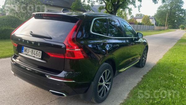 Black Volvo XC60 2021 in Riga, with an engine capacity of 2.00 L and mileage of 61 thousand km for 39990 €, photo 1 on AUTOMOTO.COM.LV