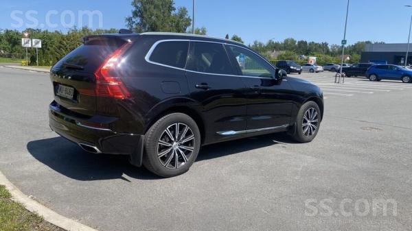 Black Volvo XC60 2021 in Riga, with an engine capacity of 2.00 L and mileage of 61 thousand km for 39990 €, photo 6 on AUTOMOTO.COM.LV