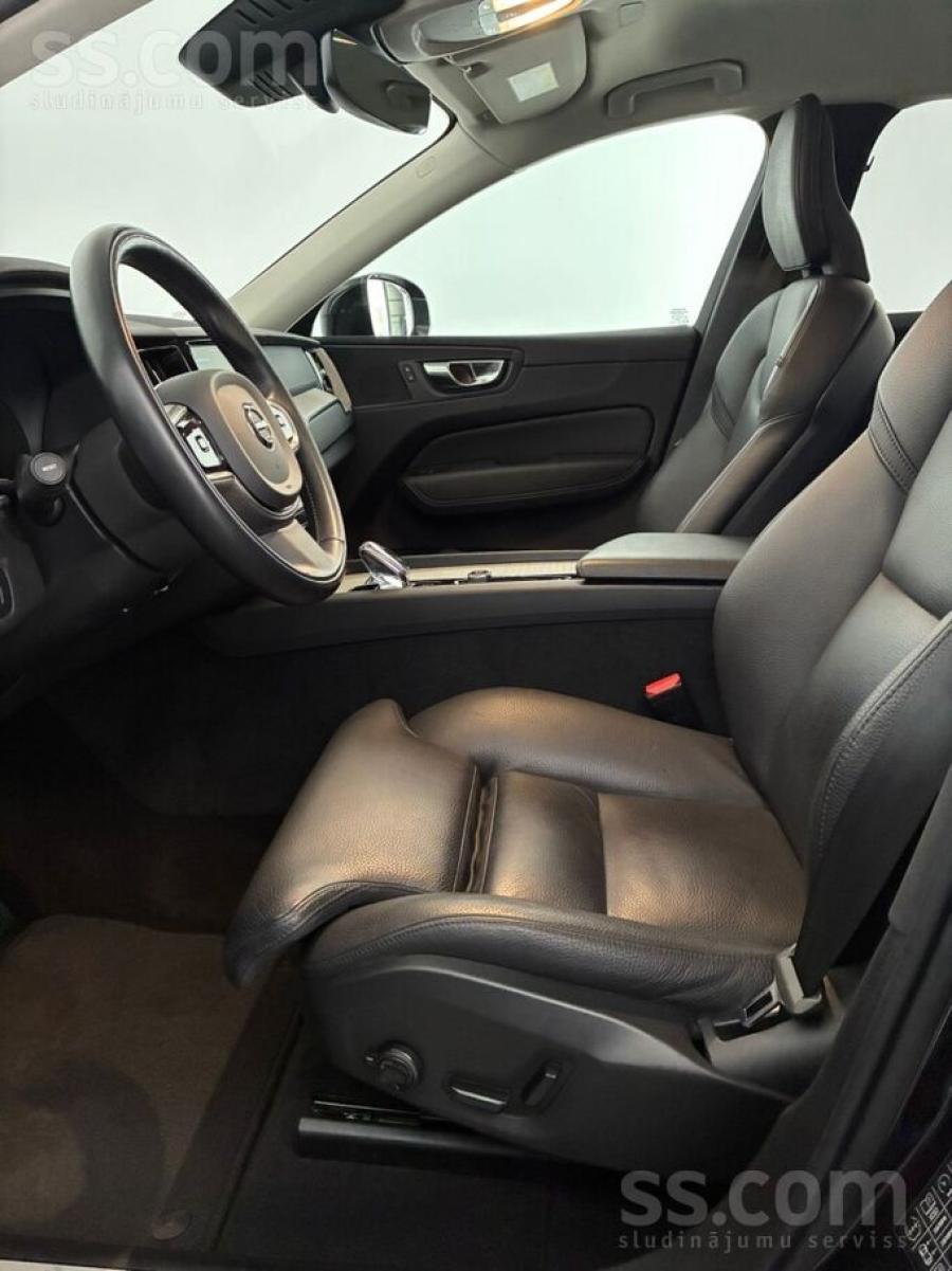 Black Volvo XC60 2022 in Riga, with an engine capacity of 2.00 L and mileage of 118 thousand km for 34990 €, photo 8 on AUTOMOTO.COM.LV