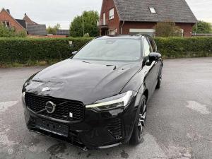 Black Volvo XC60 2023 in Prienai, with an engine capacity of 1.97 L and mileage of 99 thousand km for 29900 €, photo  on AUTOMOTO.COM.LV