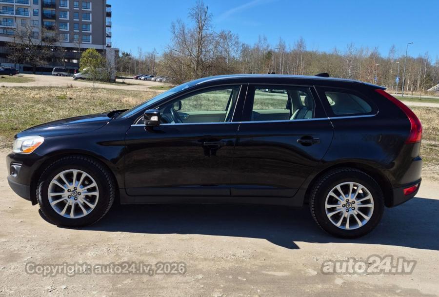 Black Volvo XC60 2009 in Tallinn, with an engine capacity of 2.40 L and mileage of 260 thousand km for 7490 €, photo 6 on AUTOMOTO.COM.LV