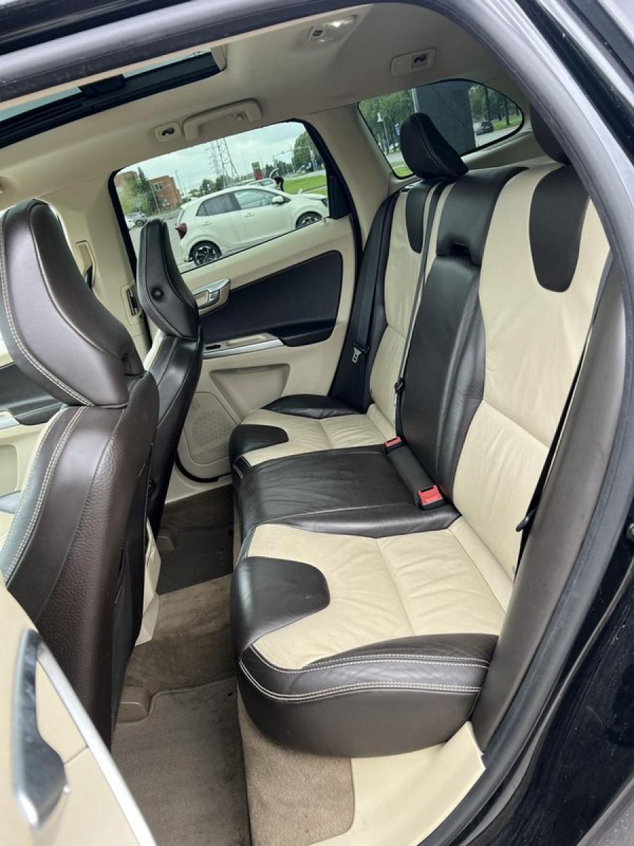 Black Volvo XC60 2009 in Narva, with an engine capacity of 2.40 L and mileage of 322 thousand km for 5499 €, photo 23 on AUTOMOTO.COM.LV