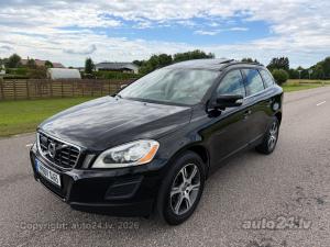 Black Volvo XC60 2010 in Tallinn, with an engine capacity of 2.40 L and mileage of 329 thousand km for 9490 €, photo  on AUTOMOTO.COM.LV