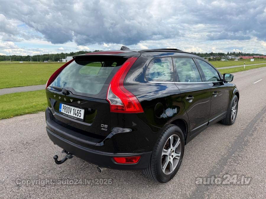 Black Volvo XC60 2010 in Tallinn, with an engine capacity of 2.40 L and mileage of 329 thousand km for 9490 €, photo 5 on AUTOMOTO.COM.LV