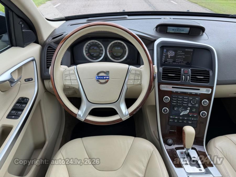 Black Volvo XC60 2010 in Tallinn, with an engine capacity of 2.40 L and mileage of 329 thousand km for 9490 €, photo 6 on AUTOMOTO.COM.LV