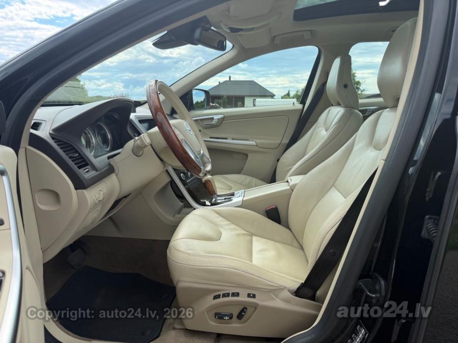 Black Volvo XC60 2010 in Tallinn, with an engine capacity of 2.40 L and mileage of 329 thousand km for 9490 €, photo 8 on AUTOMOTO.COM.LV