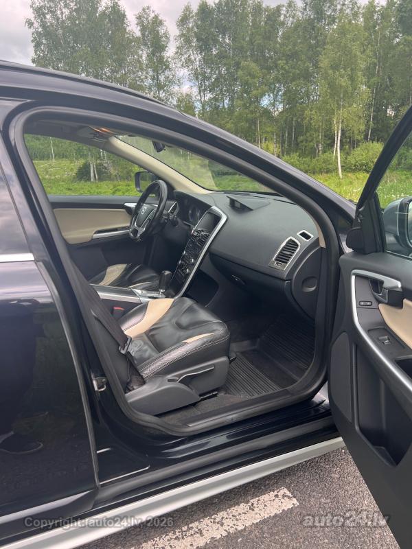 Black Volvo XC60 2010 in Tallinn, with an engine capacity of 2.40 L and mileage of 412 thousand km for 8400 €, photo 3 on AUTOMOTO.COM.LV