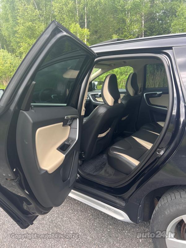 Black Volvo XC60 2010 in Tallinn, with an engine capacity of 2.40 L and mileage of 412 thousand km for 8400 €, photo 5 on AUTOMOTO.COM.LV