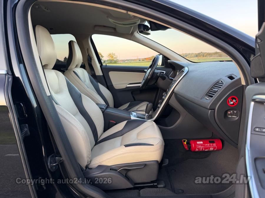 Melns Volvo XC60 2011 Tallina, ar dzinēja tilpumu 2.40 L un nobraukumu 275 tūkst. km par 10990 €, foto 13 vietnē AUTOMOTO.COM.LV
