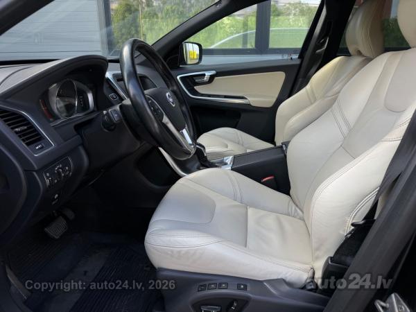 Black Volvo XC60 2013 in Tallinn, with an engine capacity of 2.40 L and mileage of 303 thousand km for 10399 €, photo 7 on AUTOMOTO.COM.LV