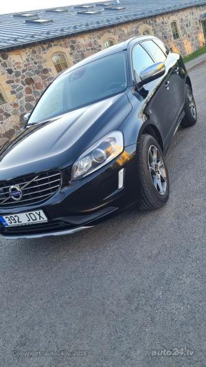 Black Volvo XC60 2016 in Rakvere, with an engine capacity of 2.40 L and mileage of 265 thousand km for 17900 €, photo 6 on AUTOMOTO.COM.LV