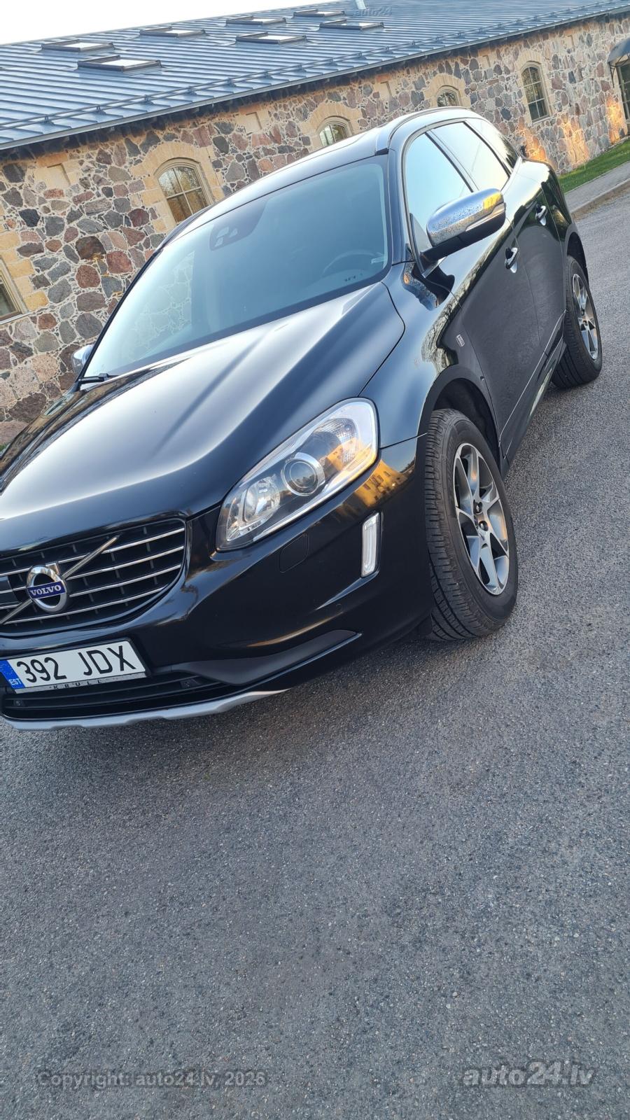 Black Volvo XC60 2016 in Rakvere, with an engine capacity of 2.40 L and mileage of 265 thousand km for 17900 €, photo 6 on AUTOMOTO.COM.LV