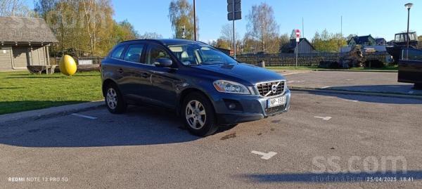 Blue Volvo XC60 2009 in Riga, with an engine capacity of 2.40 L and mileage of 284 thousand km for 8200 €, photo 6 on AUTOMOTO.COM.LV