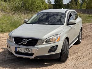 Zils Volvo XC60 2009 Rīga, ar dzinēja tilpumu 2.40 L un nobraukumu 319 tūkst. km par 6300 €, foto  vietnē AUTOMOTO.COM.LV