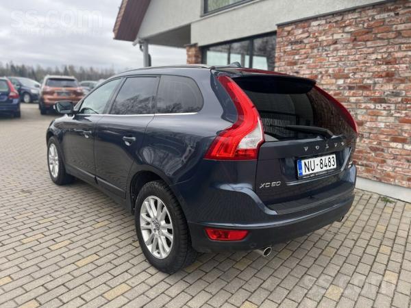 Blue Volvo XC60 2009 in Talsi, with an engine capacity of 2.40 L and mileage of 242 thousand km for 9890 €, photo 4 on AUTOMOTO.COM.LV