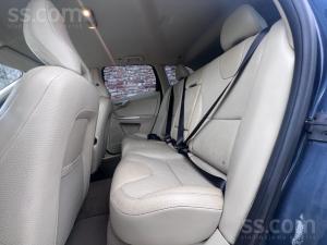 Blue Volvo XC60 2009 in Talsi, with an engine capacity of 2.40 L and mileage of 242 thousand km for 9890 €, photo 12 on AUTOMOTO.COM.LV