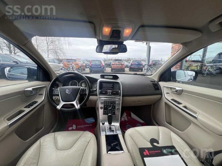 Blue Volvo XC60 2009 in Talsi, with an engine capacity of 2.40 L and mileage of 242 thousand km for 9890 €, photo 13 on AUTOMOTO.COM.LV
