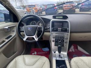 Blue Volvo XC60 2009 in Talsi, with an engine capacity of 2.40 L and mileage of 242 thousand km for 9890 €, photo 14 on AUTOMOTO.COM.LV