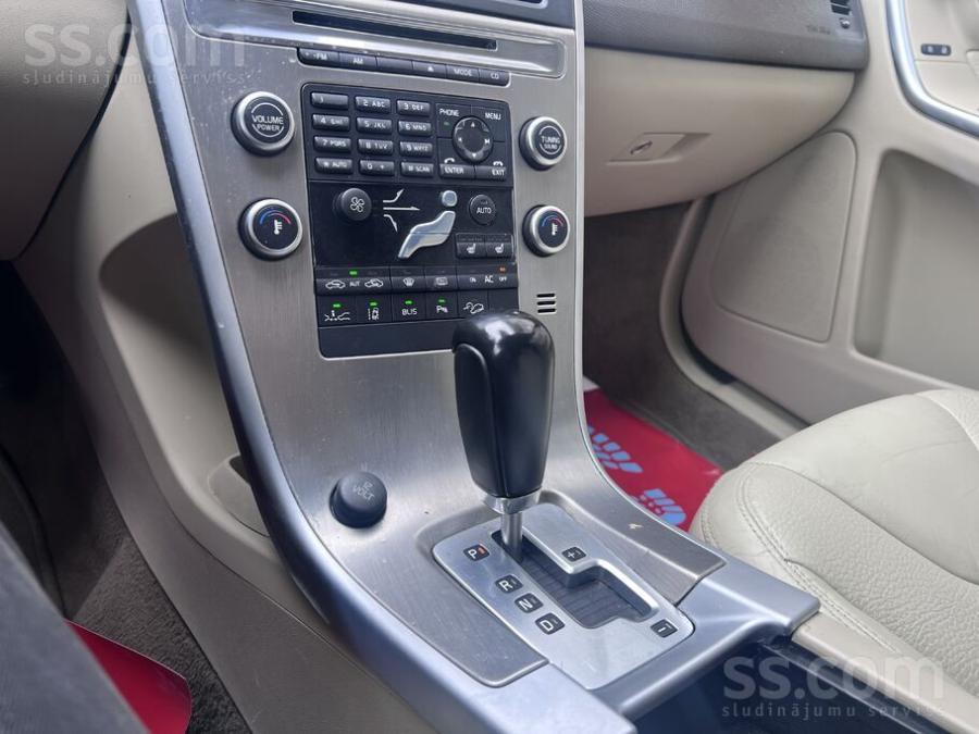 Blue Volvo XC60 2009 in Talsi, with an engine capacity of 2.40 L and mileage of 242 thousand km for 9890 €, photo 18 on AUTOMOTO.COM.LV