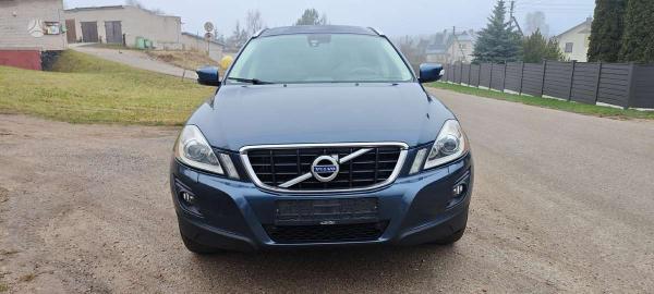Blue Volvo XC60 2010 in Utena, with an engine capacity of 2.40 L and mileage of 297 thousand km for 7650 €, photo 8 on AUTOMOTO.COM.LV