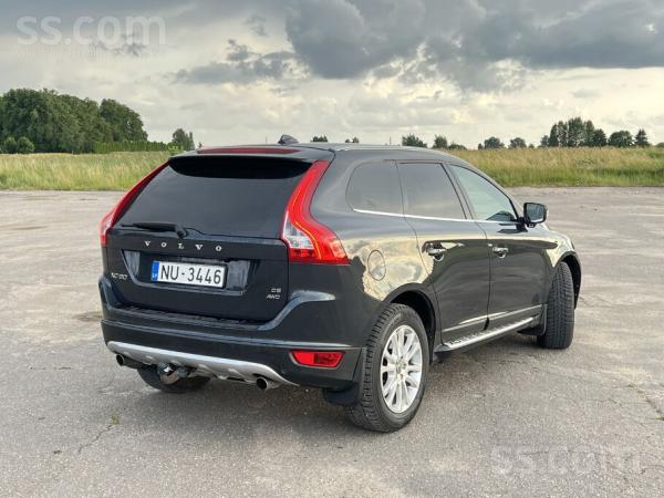 Blue Volvo XC60 2010 in Talsi, with an engine capacity of 2.40 L and mileage of 238 thousand km for 7990 €, photo 6 on AUTOMOTO.COM.LV