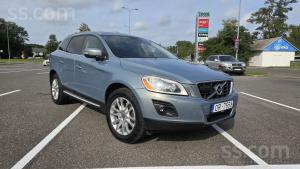 Zils Volvo XC60 2010 Rīga, ar dzinēja tilpumu 2.40 L un nobraukumu 315 tūkst. km par 6550 €, foto  vietnē AUTOMOTO.COM.LV