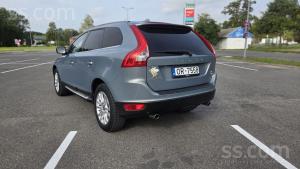 Blue Volvo XC60 2010 in Riga, with an engine capacity of 2.40 L and mileage of 315 thousand km for 6550 €, photo 3 on AUTOMOTO.COM.LV