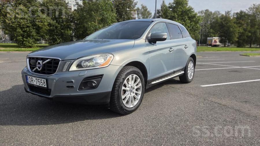 Blue Volvo XC60 2010 in Riga, with an engine capacity of 2.40 L and mileage of 315 thousand km for 6550 €, photo 5 on AUTOMOTO.COM.LV