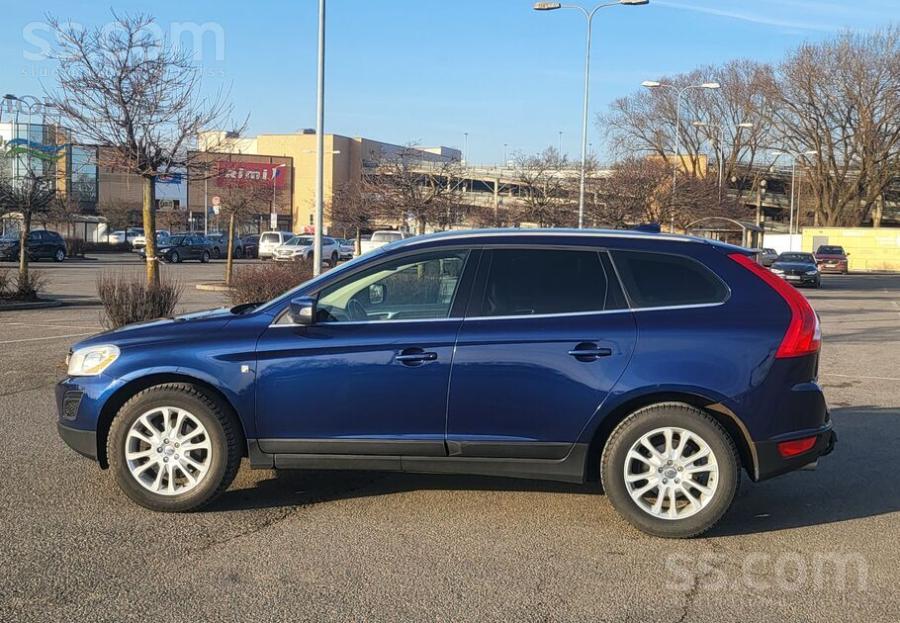 Blue Volvo XC60 2011 in Riga, with an engine capacity of 2.40 L and mileage of 286 thousand km for 8990 €, photo 5 on AUTOMOTO.COM.LV