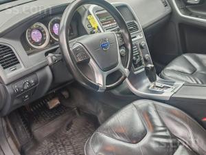 Blue Volvo XC60 2011 in Riga, with an engine capacity of 2.40 L and mileage of 286 thousand km for 8990 €, photo 13 on AUTOMOTO.COM.LV