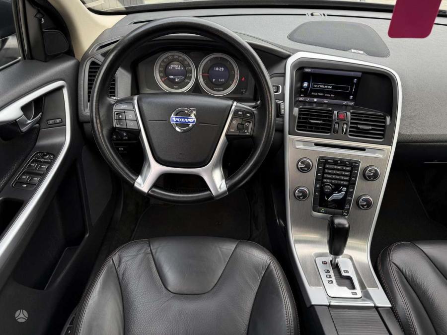 Blue Volvo XC60 2011 in Siauliai, with an engine capacity of 2.40 L and mileage of 285 thousand km for 11950 €, photo 21 on AUTOMOTO.COM.LV