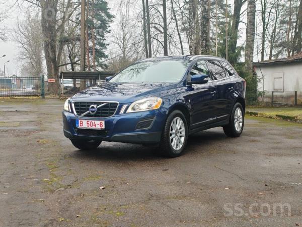 Blue Volvo XC60 2012 in Riga, with an engine capacity of 2.40 L and mileage of 285 thousand km for 10650 €, photo 3 on AUTOMOTO.COM.LV