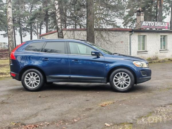Blue Volvo XC60 2012 in Riga, with an engine capacity of 2.40 L and mileage of 285 thousand km for 10650 €, photo 7 on AUTOMOTO.COM.LV